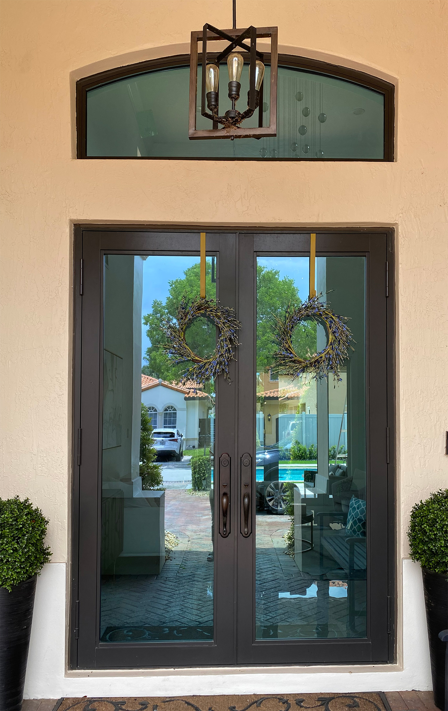 High-impact glass windows and doors, installed by Florida Aluminum Supply.